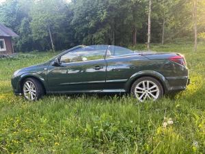 Green Opel Astra 2006 in Vilnius, with an engine capacity of 1.91 L and mileage of 286 thousand km for 1960 €, photo 18 on AUTOMOTO.COM.LV