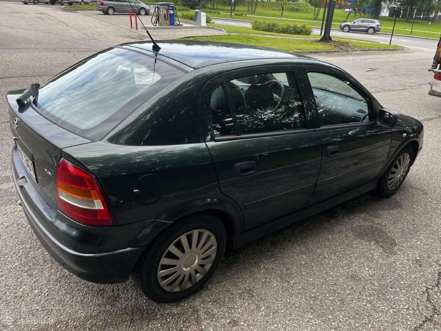 Green Opel Astra 2000 in Alytus, with an engine capacity of 2.00 L and mileage of 315 thousand km for 900 €, photo 6 on AUTOMOTO.COM.LV
