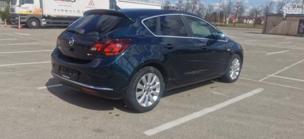Green Opel Astra 2014 in Siauliai, with an engine capacity of 1.70 L and mileage of 161 thousand km for 4450 €, photo 5 on AUTOMOTO.COM.LV