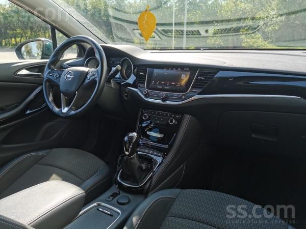 Green Opel Astra 2015 in Dobele, with an engine capacity of 1.60 L and mileage of 216 thousand km for 6490 €, photo 10 on AUTOMOTO.COM.LV
