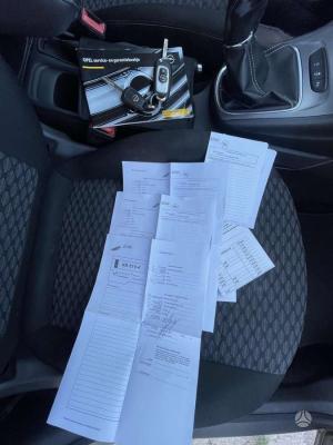 Green Opel Astra 2016 in Siauliai, with an engine capacity of 1.60 L and mileage of 210 thousand km for 4950 €, photo 26 on AUTOMOTO.COM.LV