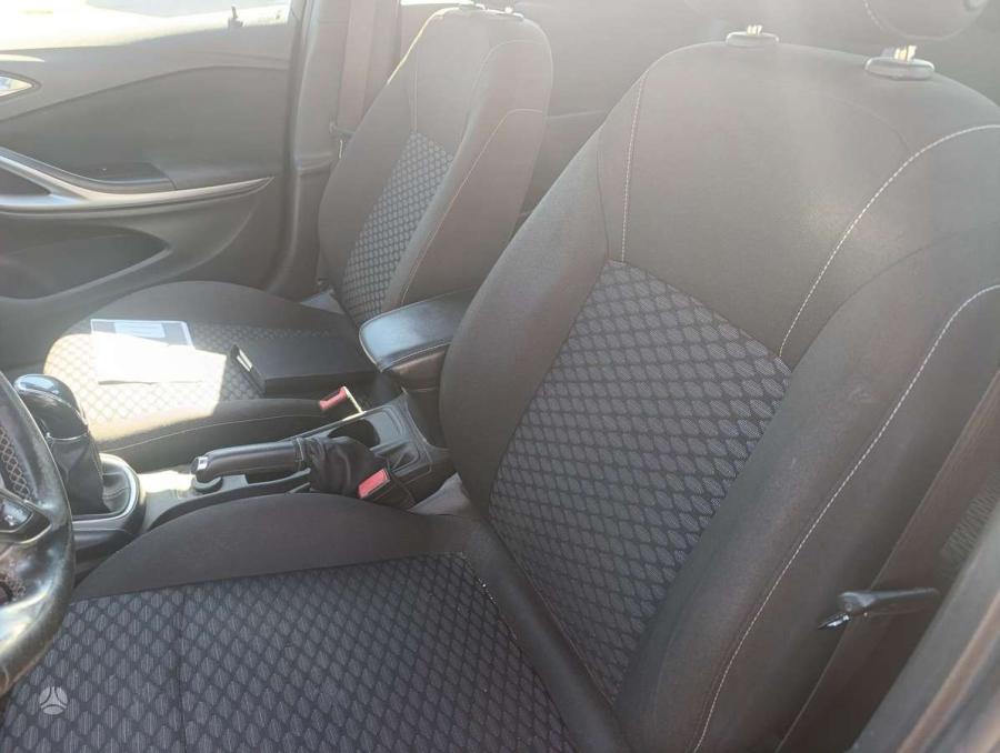 Green Opel Astra 2019 in Panevezys, with an engine capacity of 1.60 L and mileage of 200 thousand km for 2800 €, photo 13 on AUTOMOTO.COM.LV