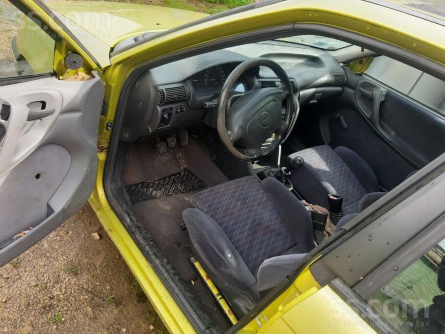 Green Opel Astra 1996 in Ogre, with an engine capacity of 1.40 L and mileage of 359 thousand km for 450 €, photo 7 on AUTOMOTO.COM.LV