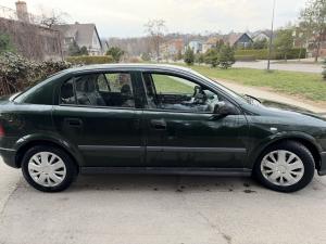 Green Opel Astra 2003 in Kaunas, with an engine capacity of 2.00 L and mileage of 350 thousand km for 1250 €, photo 5 on AUTOMOTO.COM.LV