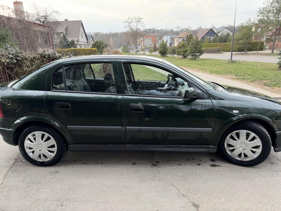Green Opel Astra 2003 in Kaunas, with an engine capacity of 2.00 L and mileage of 350 thousand km for 1250 €, photo 5 on AUTOMOTO.COM.LV