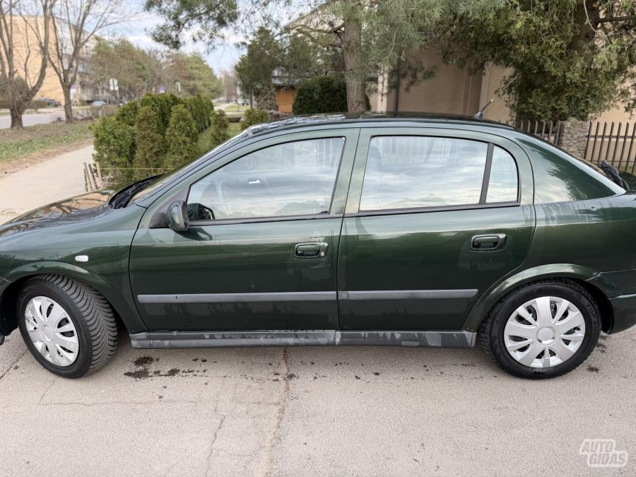 Green Opel Astra 2003 in Kaunas, with an engine capacity of 2.00 L and mileage of 350 thousand km for 1250 €, photo 9 on AUTOMOTO.COM.LV