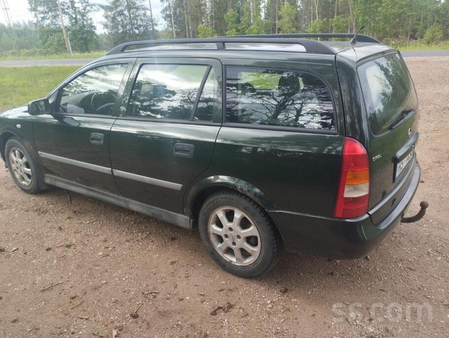 Green Opel Astra 2001 in Riga, with an engine capacity of 1.60 L and mileage of 302 thousand km for 550 €, photo 4 on AUTOMOTO.COM.LV