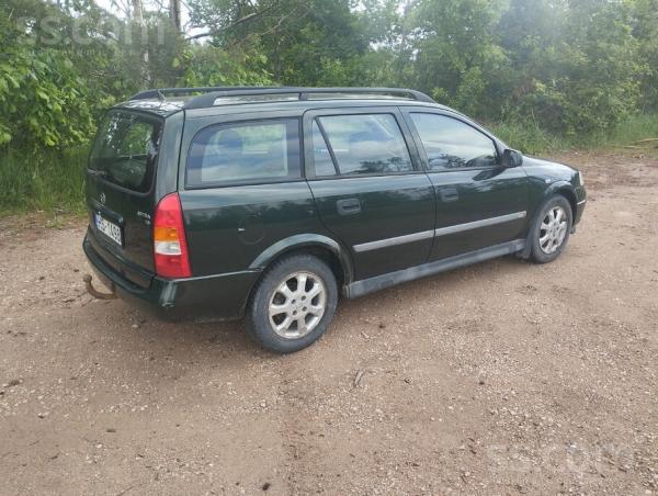 Green Opel Astra 2001 in Riga, with an engine capacity of 1.60 L and mileage of 302 thousand km for 550 €, photo 4 on AUTOMOTO.COM.LV
