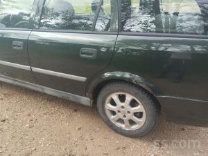 Green Opel Astra 2001 in Riga, with an engine capacity of 1.60 L and mileage of 302 thousand km for 550 €, photo 9 on AUTOMOTO.COM.LV