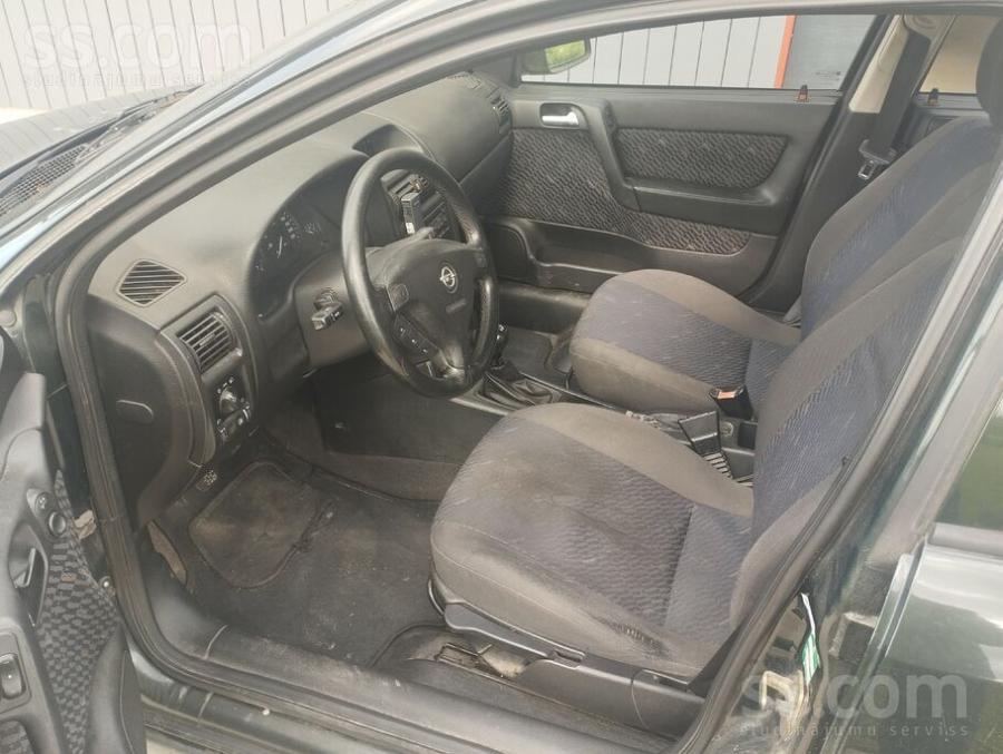 Green Opel Astra 2001 in Riga, with an engine capacity of 1.60 L and mileage of 302 thousand km for 550 €, photo 12 on AUTOMOTO.COM.LV