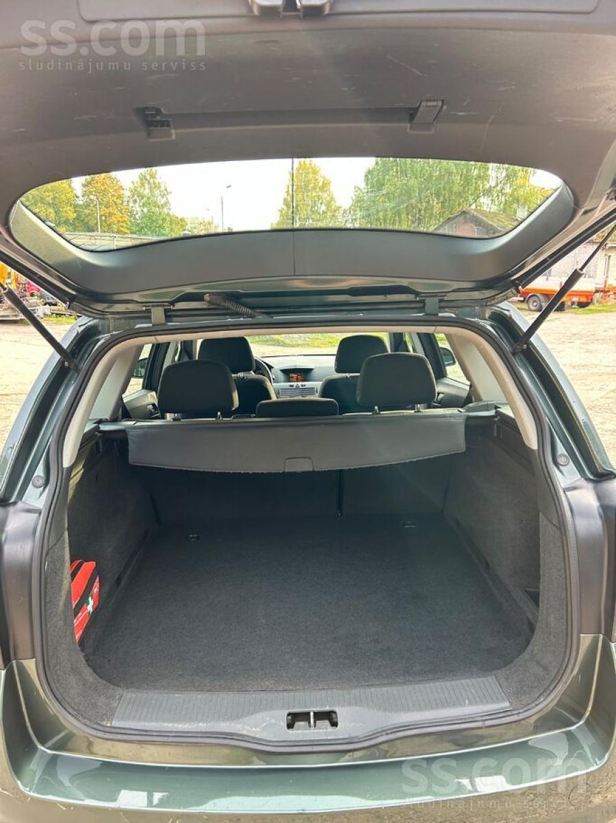 Zaļš Opel Astra 2010 Rīga, ar dzinēja tilpumu 1.70 L un nobraukumu 320 tūkst. km par 2000 €, foto 12 vietnē AUTOMOTO.COM.LV