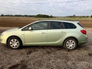 Green Opel Astra 2011 in Talsi, with an engine capacity of 1.40 L and mileage of 193 thousand km for 4500 €, photo 7 on AUTOMOTO.COM.LV