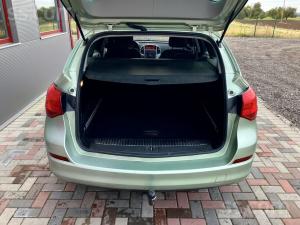 Green Opel Astra 2011 in Talsi, with an engine capacity of 1.40 L and mileage of 193 thousand km for 4500 €, photo 11 on AUTOMOTO.COM.LV
