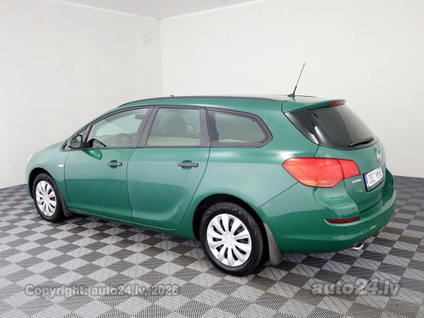 Green Opel Astra 2011 in Tallinn, with an engine capacity of 1.40 L and mileage of 327 thousand km for 1199 €, photo 5 on AUTOMOTO.COM.LV