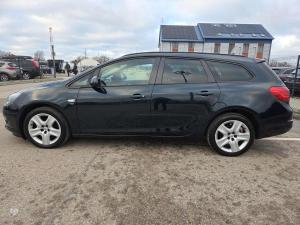 Green Opel Astra 2014 in Marijampole, with an engine capacity of 1.36 L and mileage of 202 thousand km for 4900 €, photo 7 on AUTOMOTO.COM.LV