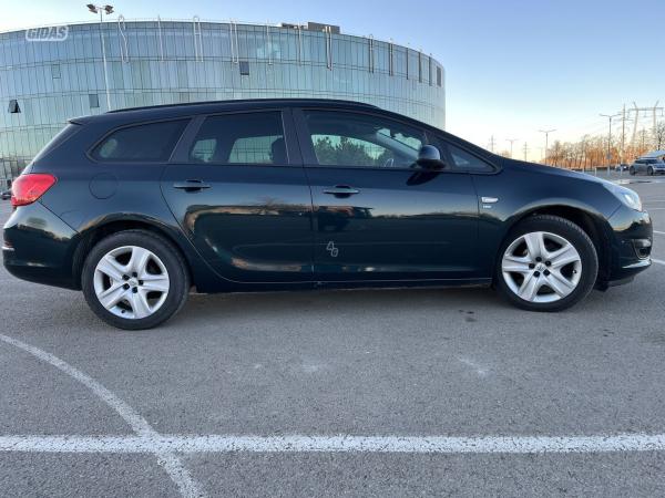 Green Opel Astra 2014 in Siauliai, with an engine capacity of 1.40 L and mileage of 206 thousand km for 5500 €, photo 4 on AUTOMOTO.COM.LV