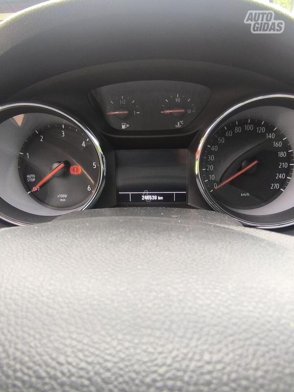 Green Opel Astra 2017 in Alytus, with an engine capacity of 1.60 L and mileage of 247 thousand km for 5800 €, photo 9 on AUTOMOTO.COM.LV