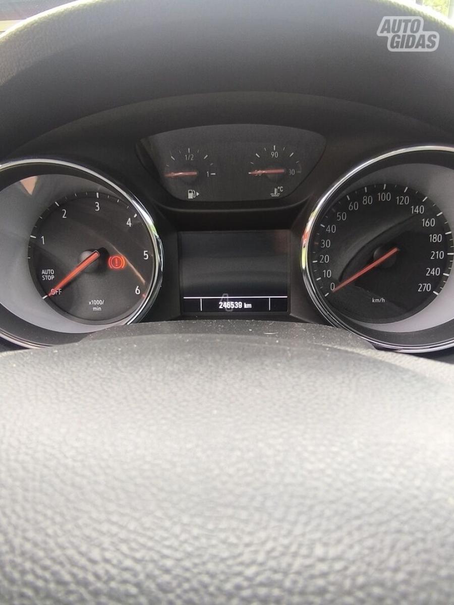Green Opel Astra 2017 in Alytus, with an engine capacity of 1.60 L and mileage of 247 thousand km for 5800 €, photo 9 on AUTOMOTO.COM.LV