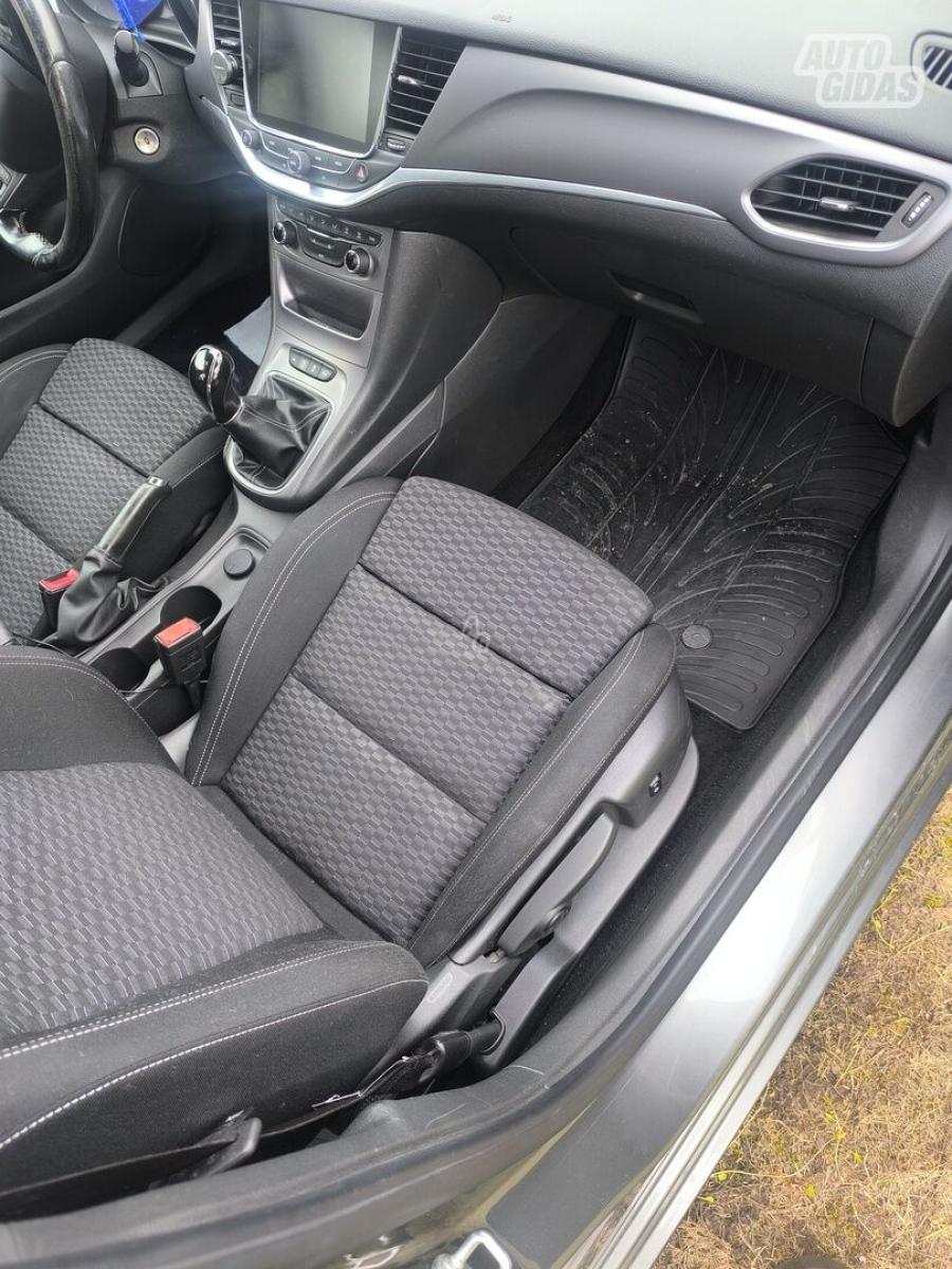 Green Opel Astra 2017 in Alytus, with an engine capacity of 1.60 L and mileage of 247 thousand km for 5800 €, photo 10 on AUTOMOTO.COM.LV