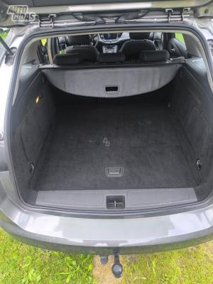 Green Opel Astra 2017 in Alytus, with an engine capacity of 1.60 L and mileage of 247 thousand km for 5800 €, photo 14 on AUTOMOTO.COM.LV