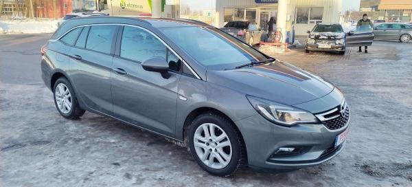 Green Opel Astra 2018 in Klaipeda, with an engine capacity of 1.60 L and mileage of 171 thousand km for 6900 €, photo 8 on AUTOMOTO.COM.LV