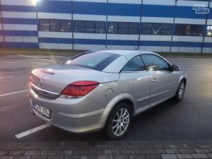 Grey Opel Astra 2010 in Vilnius, with an engine capacity of 1.90 L and mileage of 295 thousand km for 4200 €, photo 6 on AUTOMOTO.COM.LV