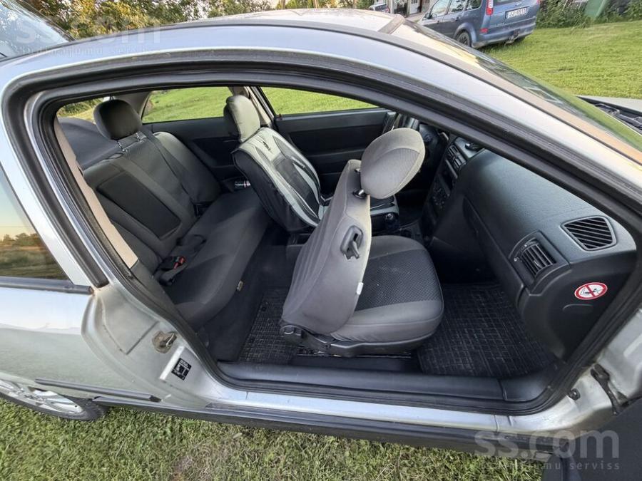 Grey Opel Astra 1999 in Riga, with an engine capacity of 1.80 L and mileage of 206 thousand km for 350 €, photo 13 on AUTOMOTO.COM.LV