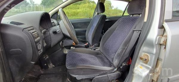 Pelēks Opel Astra 1999 Kuldīga, ar dzinēja tilpumu 1.80 L un nobraukumu 353 tūkst. km par 400 €, foto 7 vietnē AUTOMOTO.COM.LV