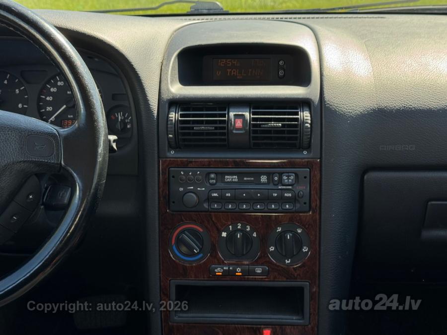 Grey Opel Astra 2000 in Tallinn, with an engine capacity of 1.80 L and mileage of 193 thousand km for 780 €, photo 13 on AUTOMOTO.COM.LV