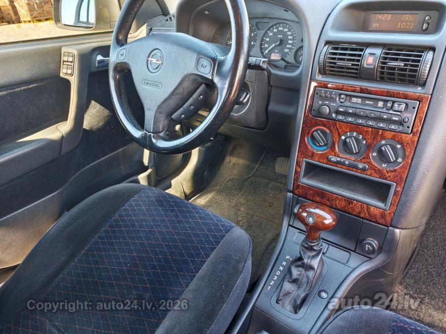 Серый Опель Астра 2000 в Таллин, объемом двигателя 1.80 л и пробегом 193 тыс. км за 2099 €, фото 14 на AUTOMOTO.COM.LV