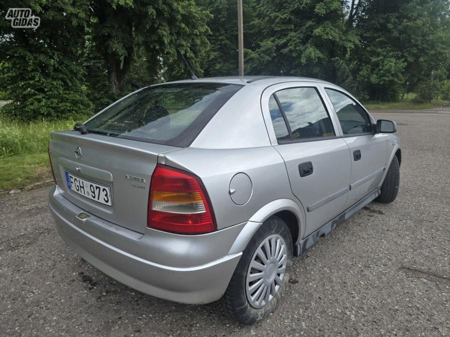 Pelēks Opel Astra 2000 Jurbarkas, ar dzinēja tilpumu 1.70 L un nobraukumu 240 tūkst. km par 777 €, foto 5 vietnē AUTOMOTO.COM.LV