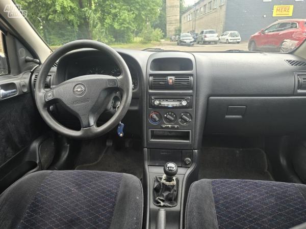 Pelēks Opel Astra 2000 Jurbarkas, ar dzinēja tilpumu 1.70 L un nobraukumu 240 tūkst. km par 777 €, foto 7 vietnē AUTOMOTO.COM.LV