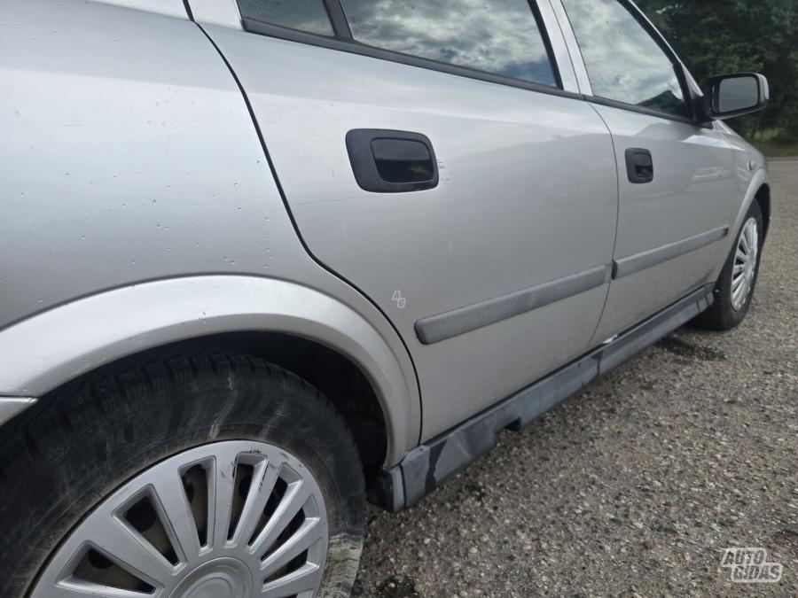 Pelēks Opel Astra 2000 Jurbarkas, ar dzinēja tilpumu 1.70 L un nobraukumu 240 tūkst. km par 777 €, foto 12 vietnē AUTOMOTO.COM.LV