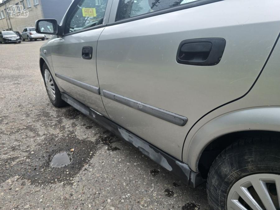 Pelēks Opel Astra 2000 Jurbarkas, ar dzinēja tilpumu 1.70 L un nobraukumu 240 tūkst. km par 777 €, foto 13 vietnē AUTOMOTO.COM.LV