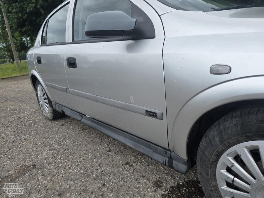 Pelēks Opel Astra 2000 Jurbarkas, ar dzinēja tilpumu 1.70 L un nobraukumu 240 tūkst. km par 777 €, foto 14 vietnē AUTOMOTO.COM.LV