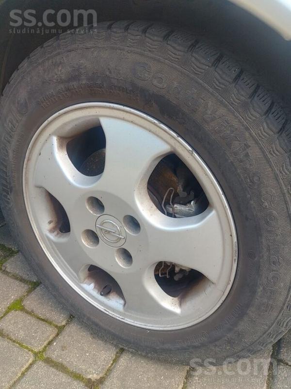 Grey Opel Astra 2000 in Riga, with an engine capacity of 1.60 L and mileage of 172 thousand km for 950 €, photo 9 on AUTOMOTO.COM.LV