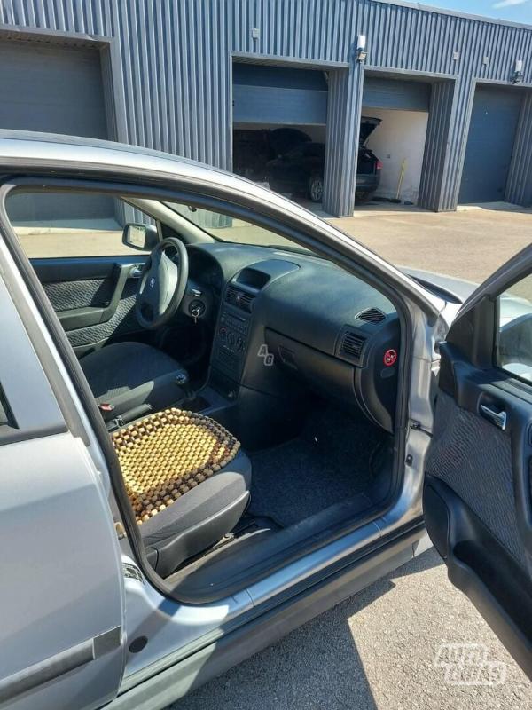 Grey Opel Astra 2001 in Kaunas, with an engine capacity of 1.60 L and mileage of 335 thousand km for 650 €, photo 8 on AUTOMOTO.COM.LV
