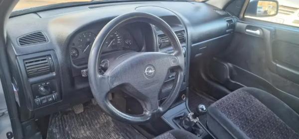 Grey Opel Astra 2001 in Valmiera, with an engine capacity of 1.60 L and mileage of 213 thousand km for 680 €, photo 8 on AUTOMOTO.COM.LV