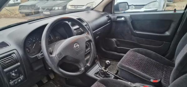 Pelēks Opel Astra 2001 Valmiera, ar dzinēja tilpumu 1.60 L un nobraukumu 213 tūkst. km par 1150 €, foto 8 vietnē AUTOMOTO.COM.LV