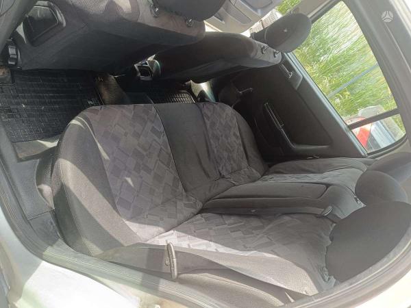 Pelēks Opel Astra 2001 Kauņa, ar dzinēja tilpumu 1.69 L un nobraukumu 315 tūkst. km par 800 €, foto 8 vietnē AUTOMOTO.COM.LV