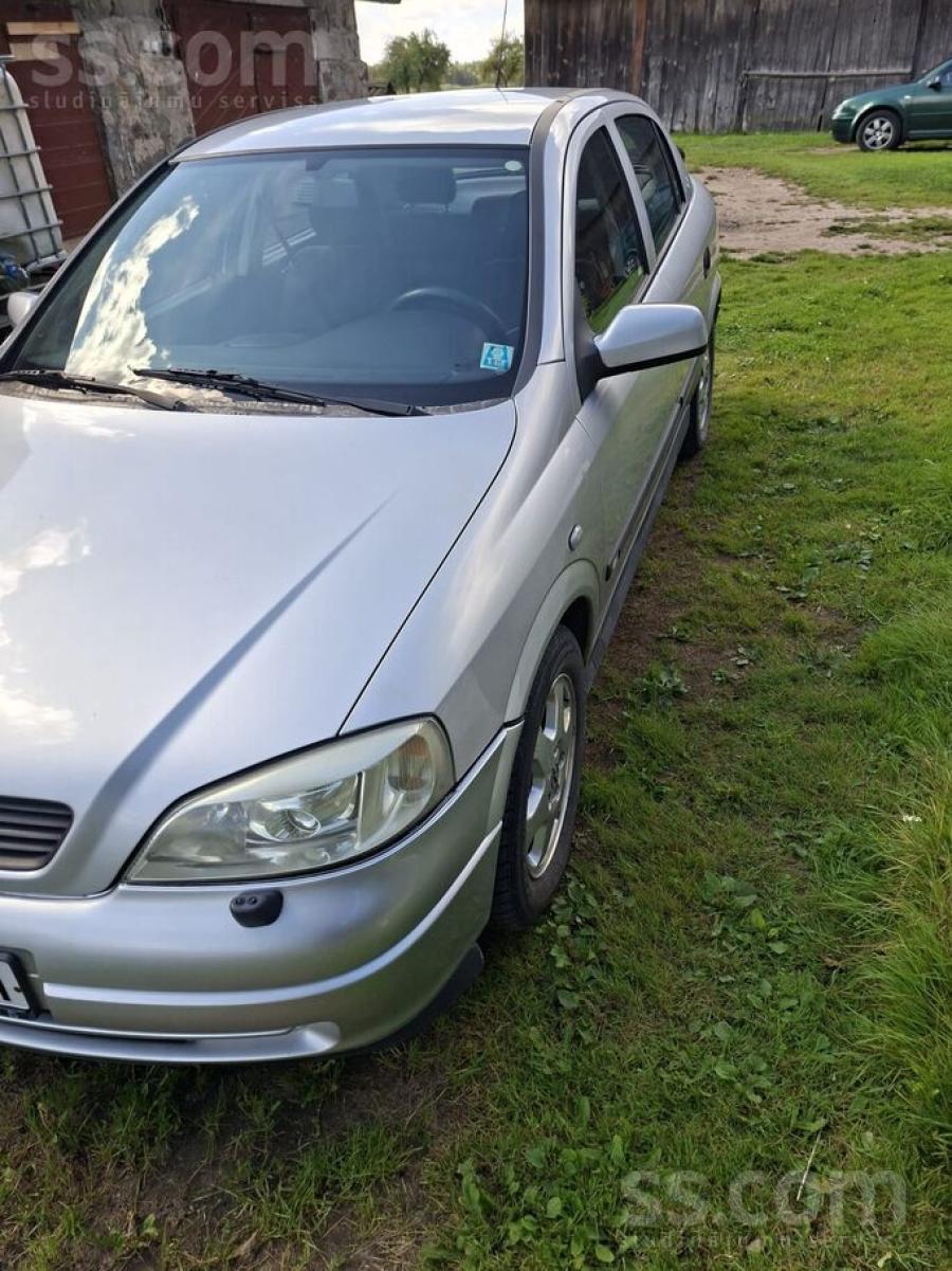 Pelēks Opel Astra 2002 Jēkabpils, ar dzinēja tilpumu 2.00 L un nobraukumu 258 tūkst. km par 600 €, foto 9 vietnē AUTOMOTO.COM.LV