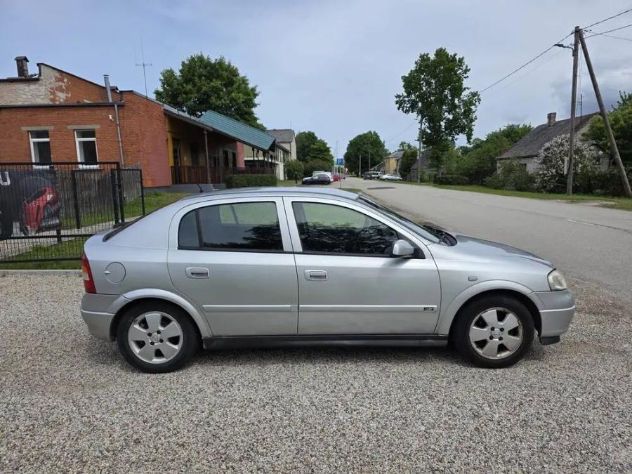 Pelēks Opel Astra 2003 Ventspils, ar dzinēja tilpumu 1.60 L un nobraukumu 180 tūkst. km par 990 €, foto 6 vietnē AUTOMOTO.COM.LV