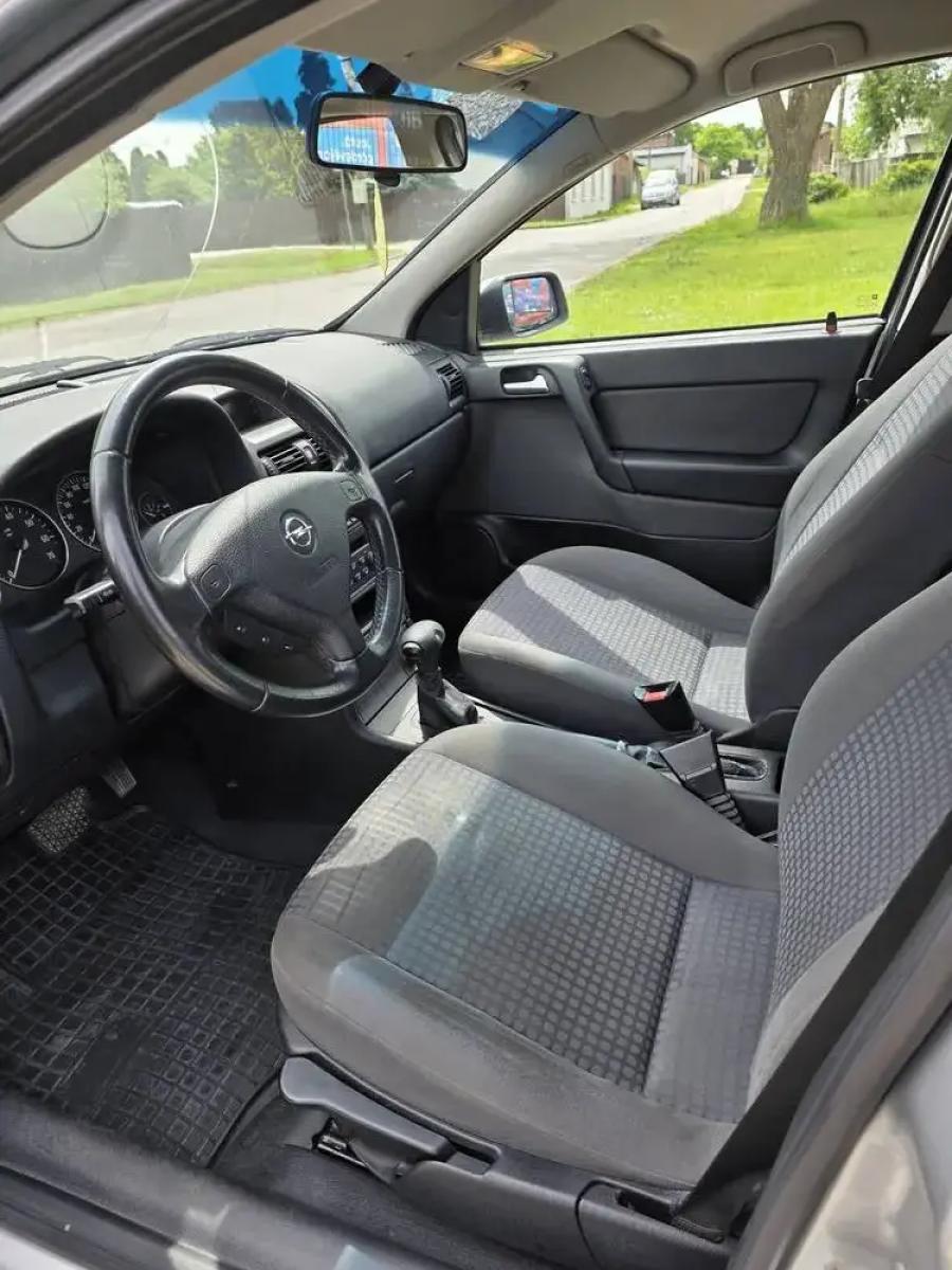 Pelēks Opel Astra 2003 Ventspils, ar dzinēja tilpumu 1.60 L un nobraukumu 180 tūkst. km par 990 €, foto 10 vietnē AUTOMOTO.COM.LV