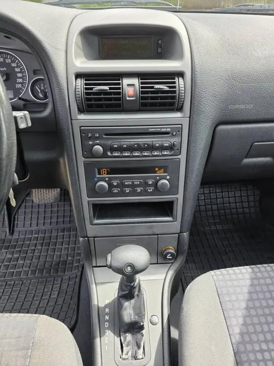 Pelēks Opel Astra 2003 Ventspils, ar dzinēja tilpumu 1.60 L un nobraukumu 180 tūkst. km par 990 €, foto 13 vietnē AUTOMOTO.COM.LV