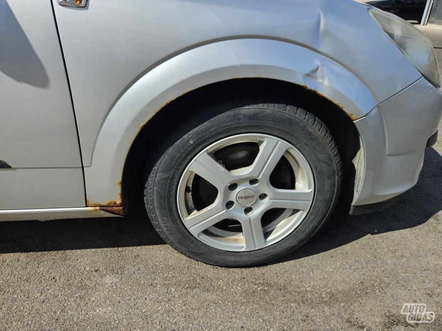 Pelēks Opel Astra 2004 Kauņa, ar dzinēja tilpumu 1.70 L un nobraukumu 355 tūkst. km par 499 €, foto 18 vietnē AUTOMOTO.COM.LV