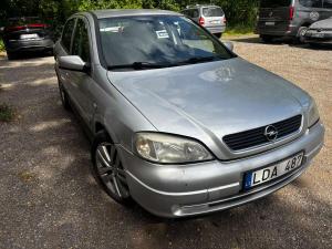 Pelēks Opel Astra 2004 Kauņa, ar dzinēja tilpumu 2.00 L un nobraukumu 400 tūkst. km par 490 €, foto  vietnē AUTOMOTO.COM.LV