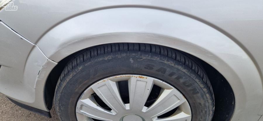 Grey Opel Astra 2007 in Kaunas, with an engine capacity of 1.30 L and mileage of 448 thousand km for 600 €, photo 20 on AUTOMOTO.COM.LV