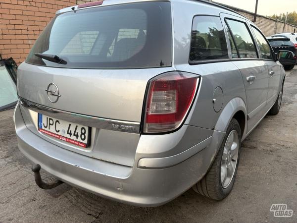 Pelēks Opel Astra 2007 Visaginas, ar dzinēja tilpumu 1.90 L un nobraukumu 300 tūkst. km par 1300 €, foto 6 vietnē AUTOMOTO.COM.LV