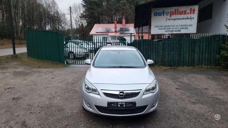 Grey Opel Astra 2010 in Vilnius, with an engine capacity of 1.60 L and mileage of 87 thousand km for 5650 €, photo 39 on AUTOMOTO.COM.LV