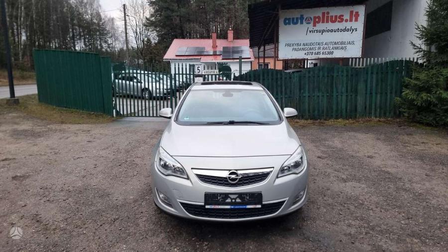 Grey Opel Astra 2010 in Vilnius, with an engine capacity of 1.60 L and mileage of 129 thousand km for 4999 €, photo 26 on AUTOMOTO.COM.LV